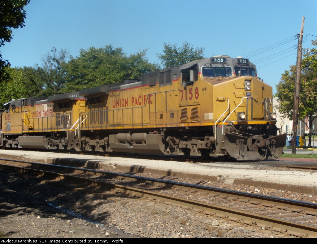UP 7158 leads a loaded coal eastbound with UP 6483 trailing